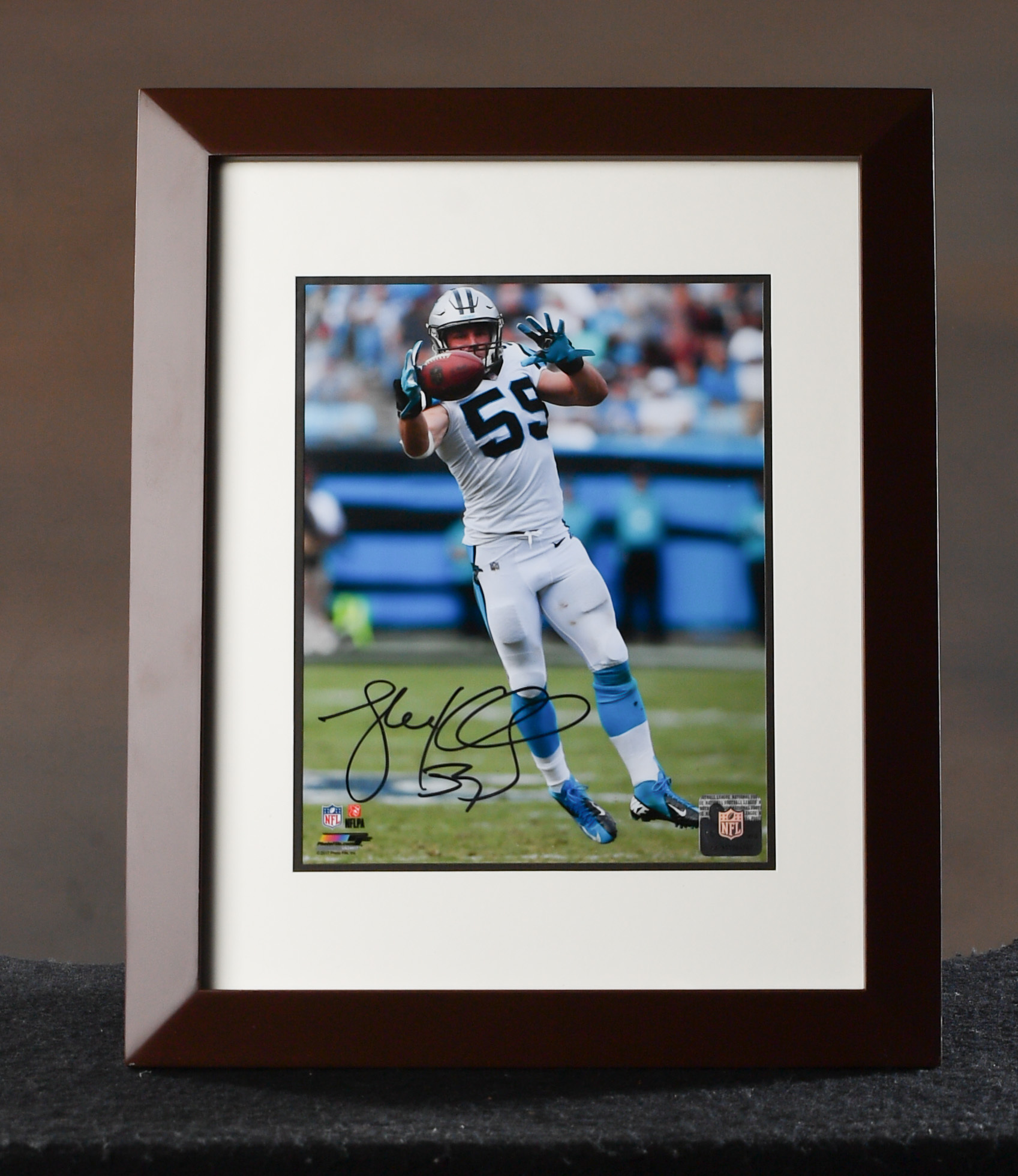 Autographed Luke Kuechly Poster 8x10 NFL Licensed