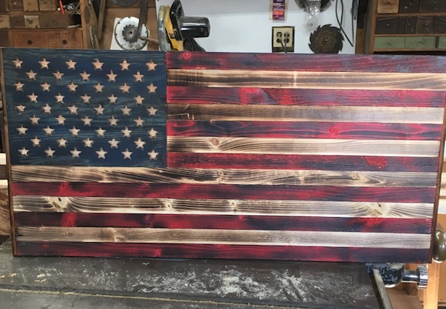 Hand carved painted flag
