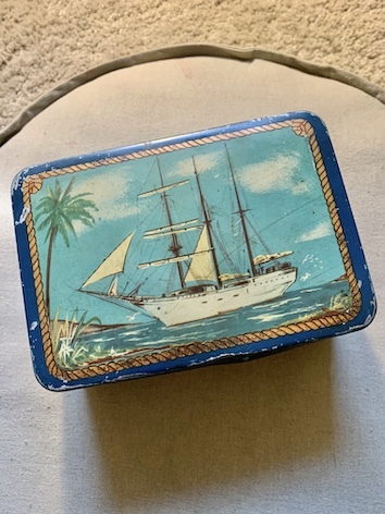 Old-Fashioned Metal Sugar Box with a Ship on the Lid