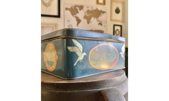 Old-Fashioned Metal Sugar Box with a Ship on the Lid