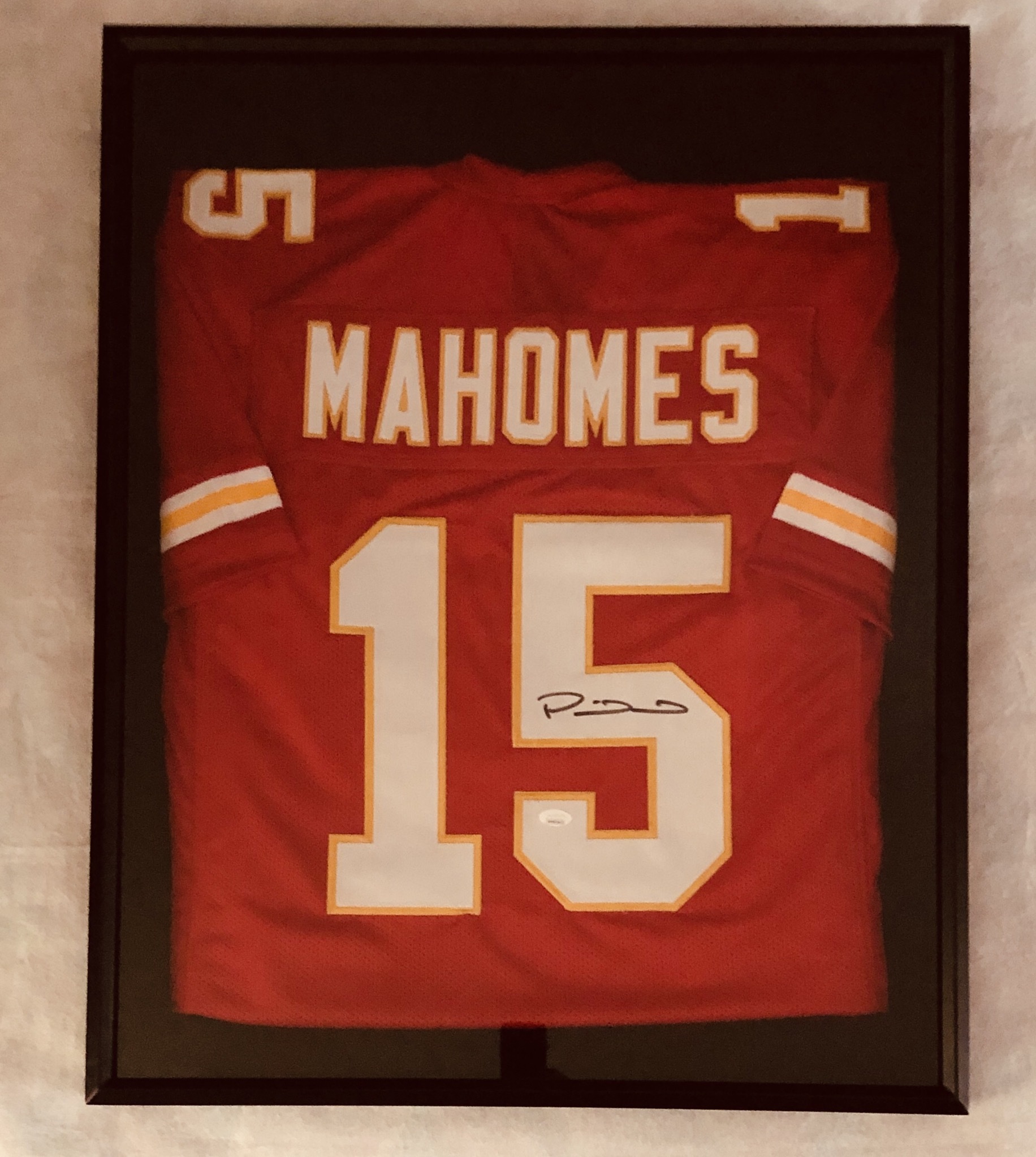 KC Chiefs Autographed Mahomes Jersey in case